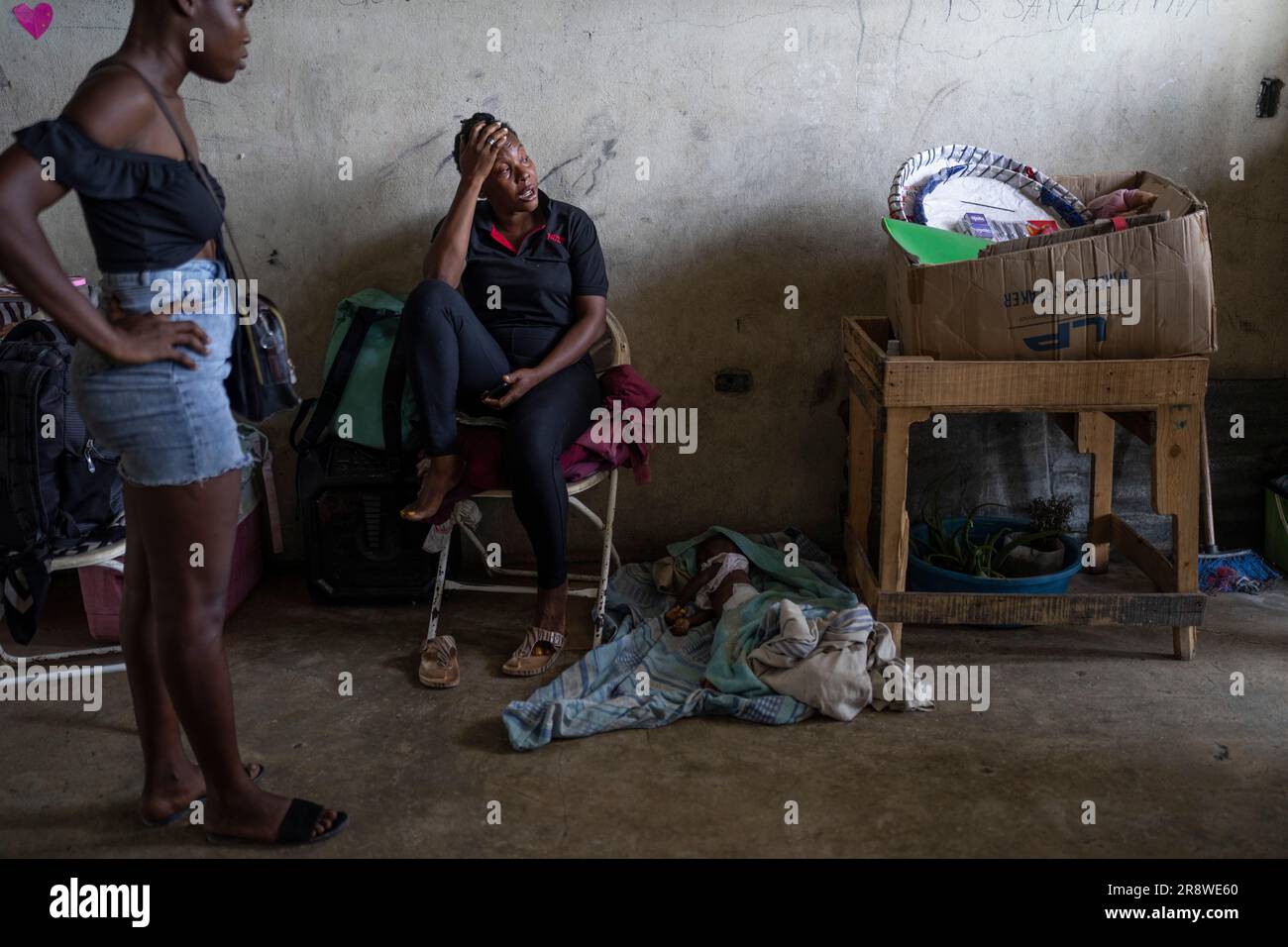 FILE - Elise Mesadieu cries as she sits next to the body of her 1-year ...