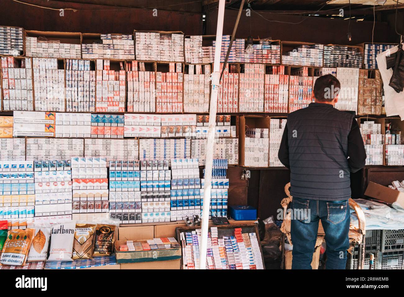 a street vendor sells cigarettes in a market in Pristina, Kosovo Stock ...