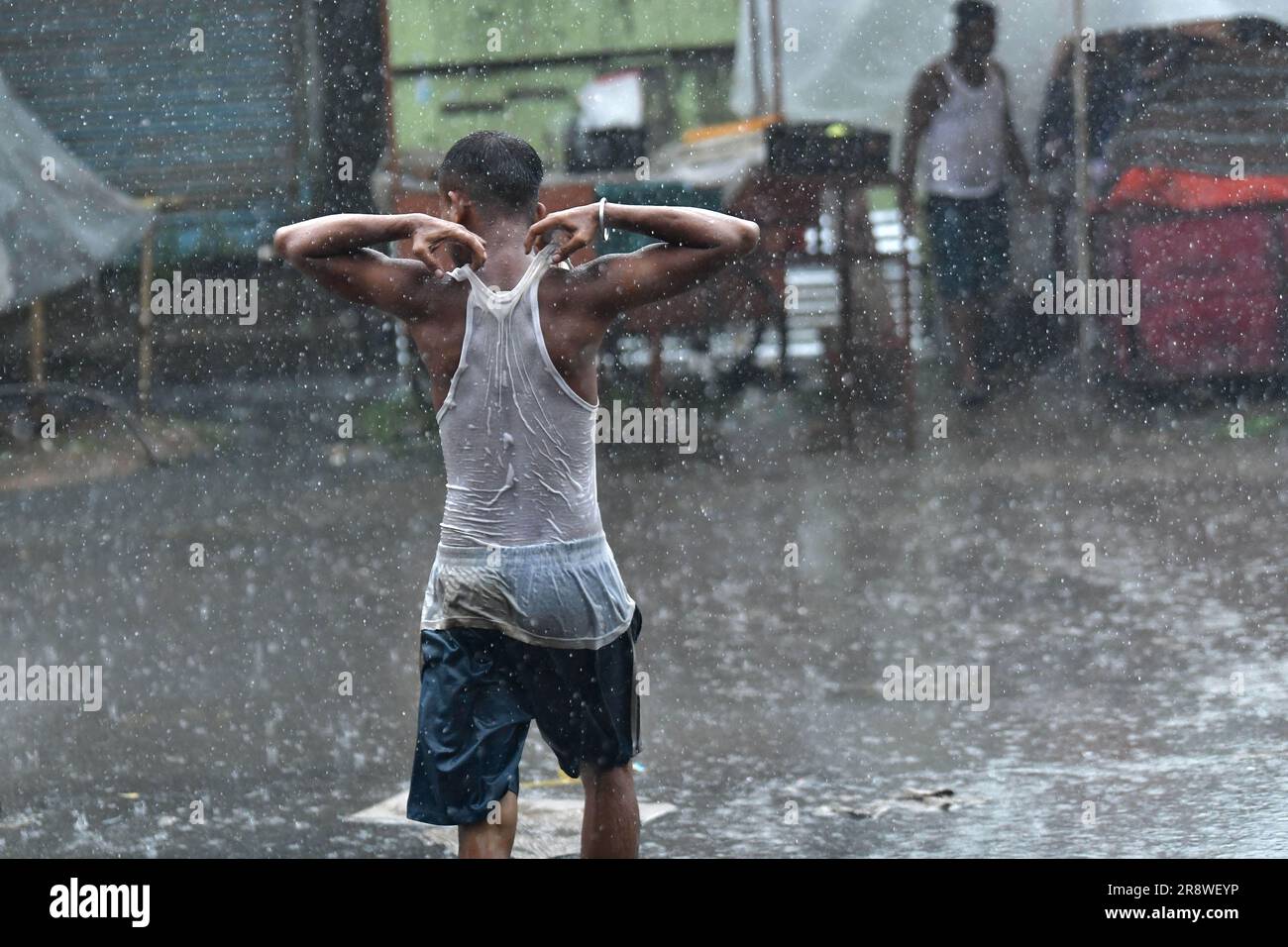 Shopkeepers in rain hi-res stock photography and images - Alamy