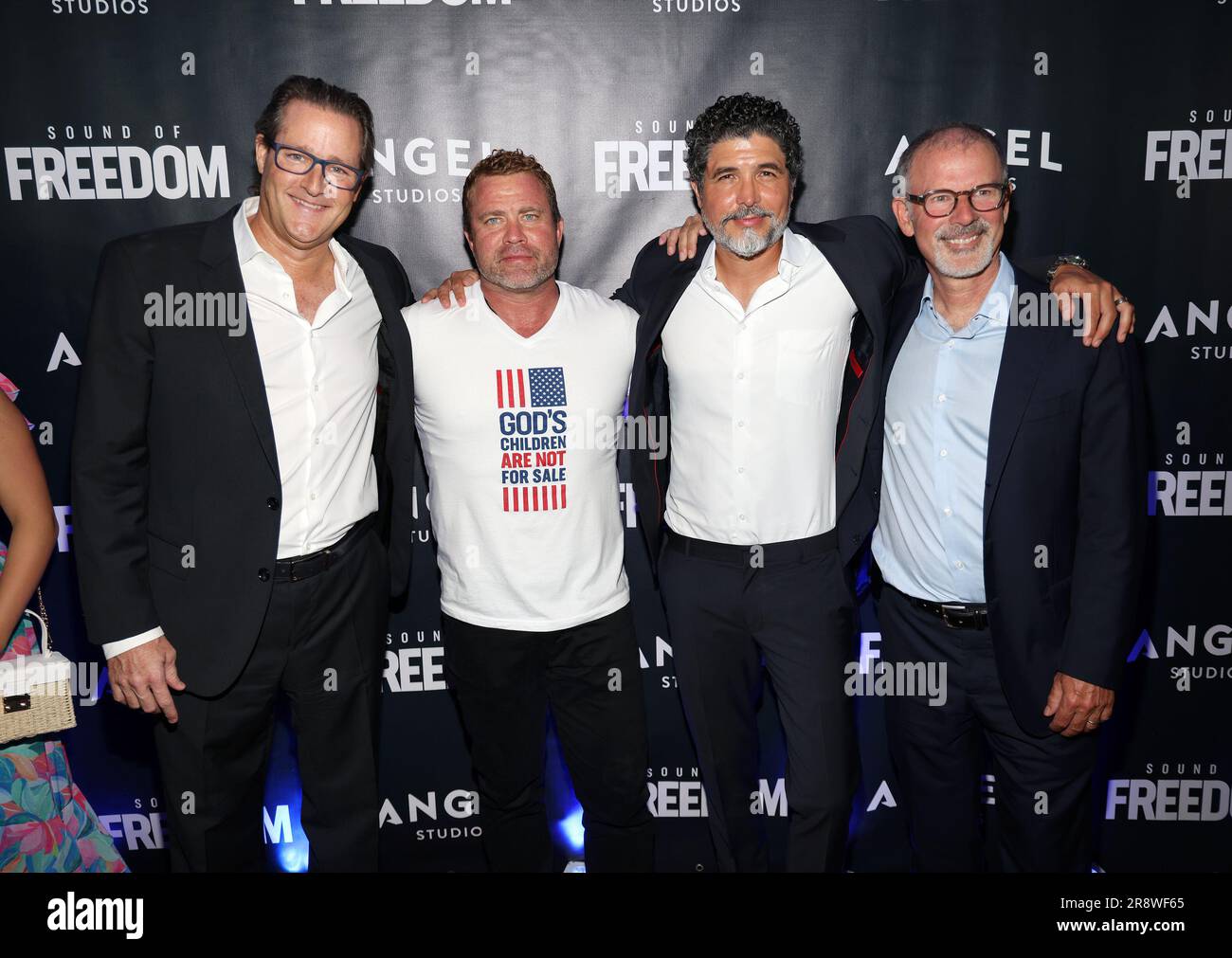 Miami Beach, FL-JUNE 22: Sean Wolfington, Tim Ballard, Alejandro ...