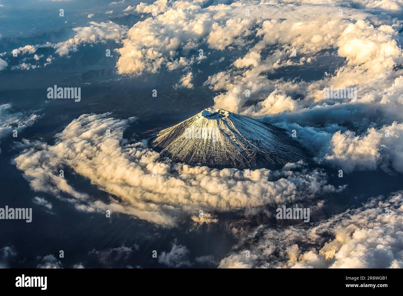 Mountain Fuji with cloud surround shot from aeroplane Stock Photo - Alamy