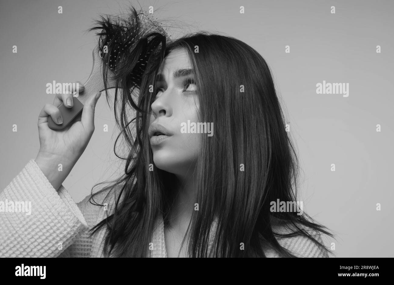 Sad woman with hair loss problem worried about hair loss Stock Photo ...