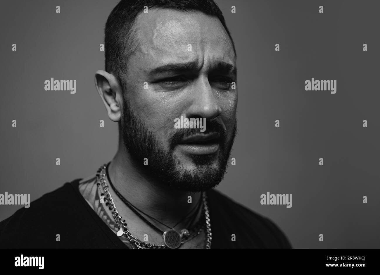 False imagination of masculinity. Crying man. Over-emotional situation ...