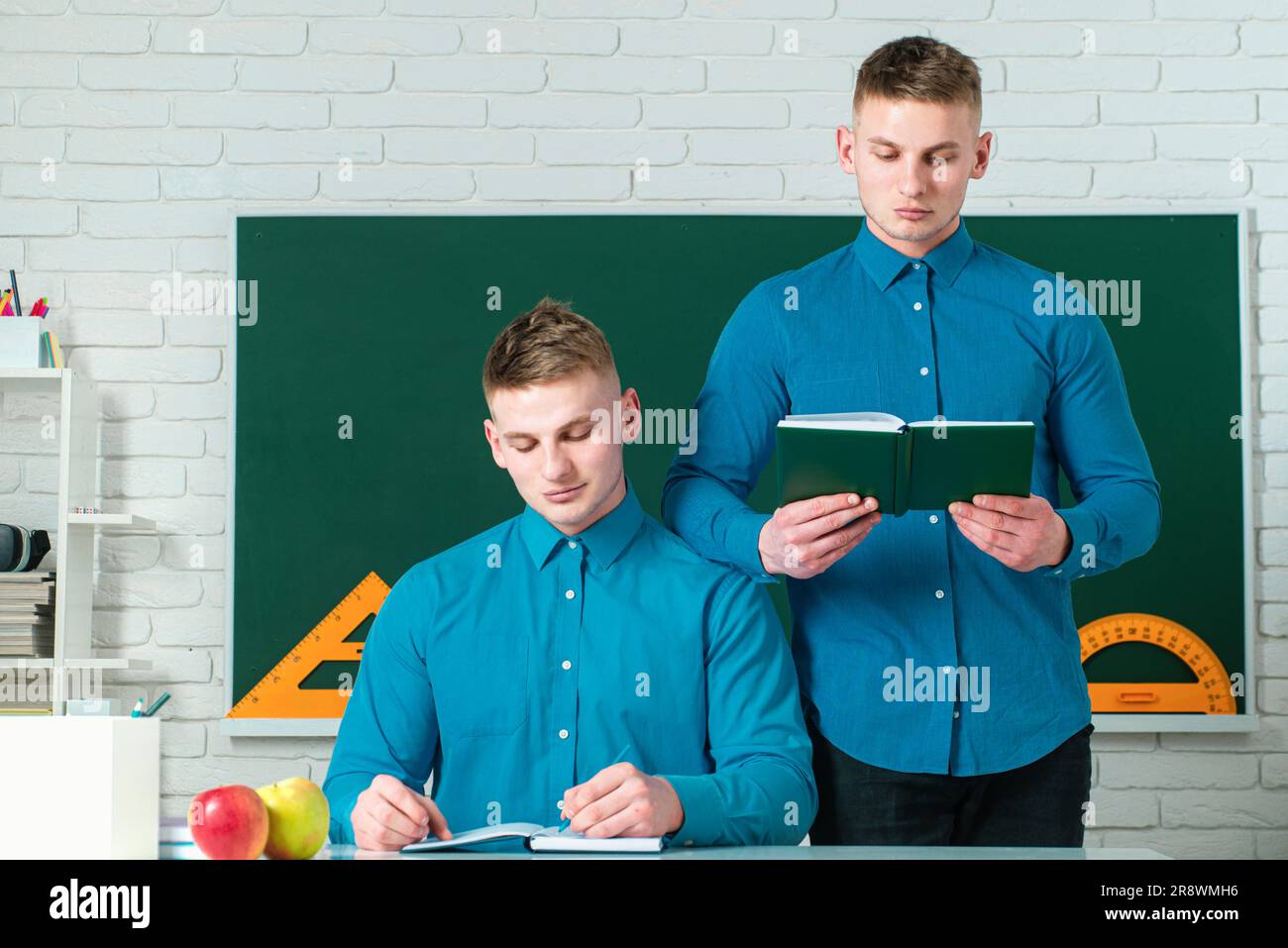 Twin boys in school uniform hi-res stock photography and images - Alamy
