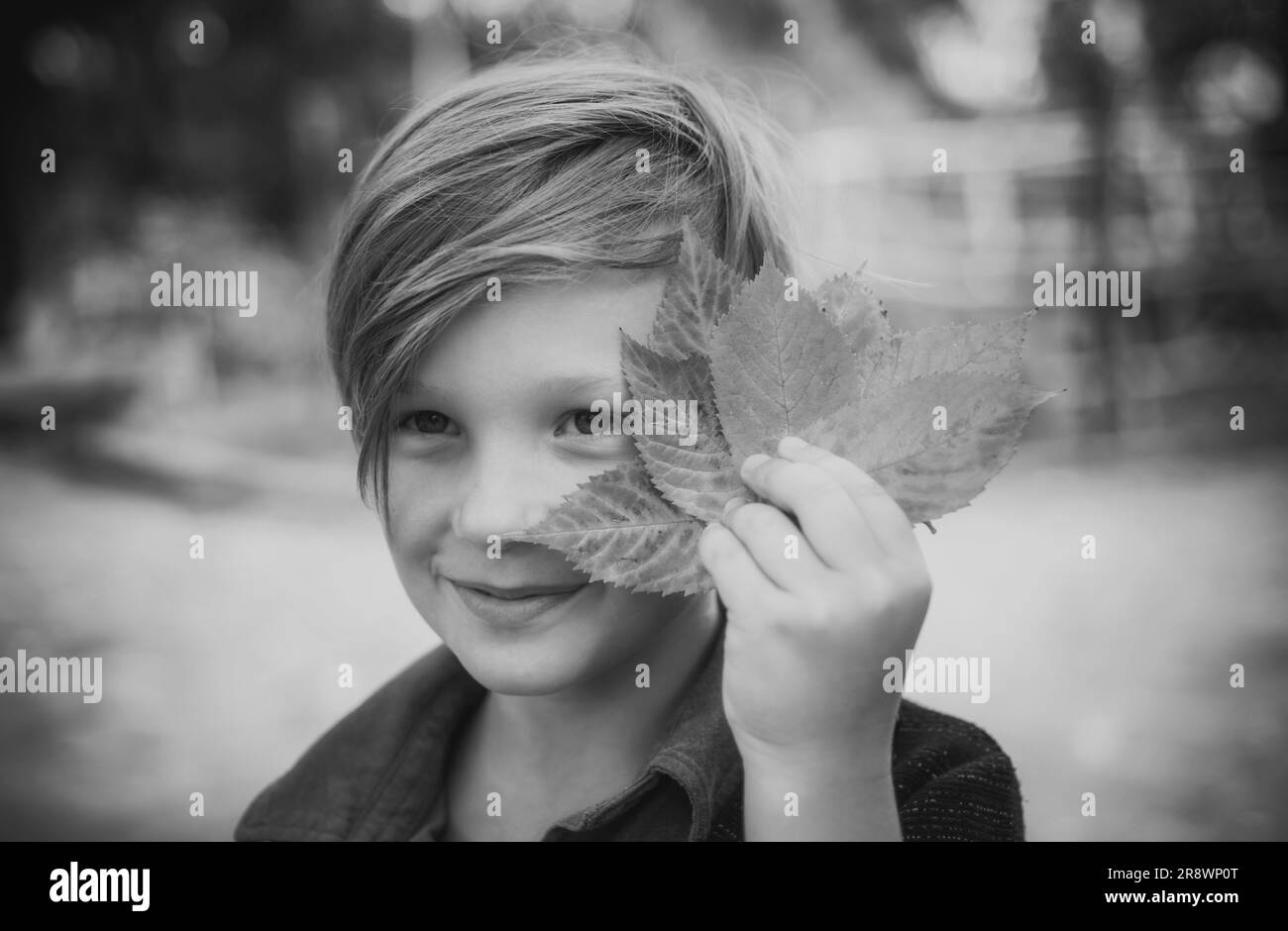 Kid on an autumn holiday in the farm. Bye summer - hi autumn. Fair ...