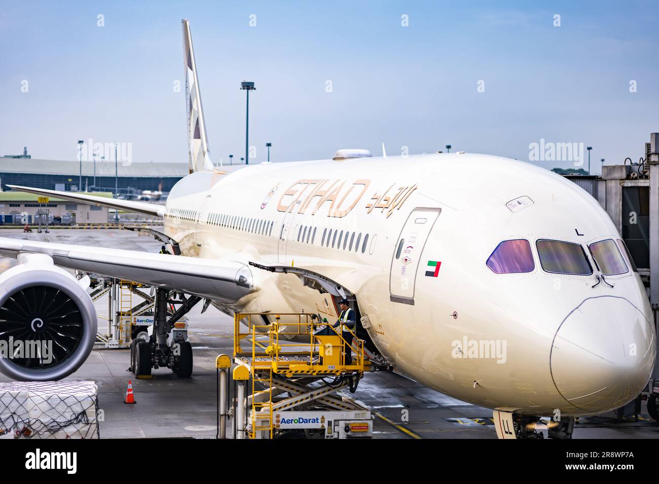 Abu Dhabi, UAE - December 2022: Etihad aircraft on runway at Abu Dhabi ...