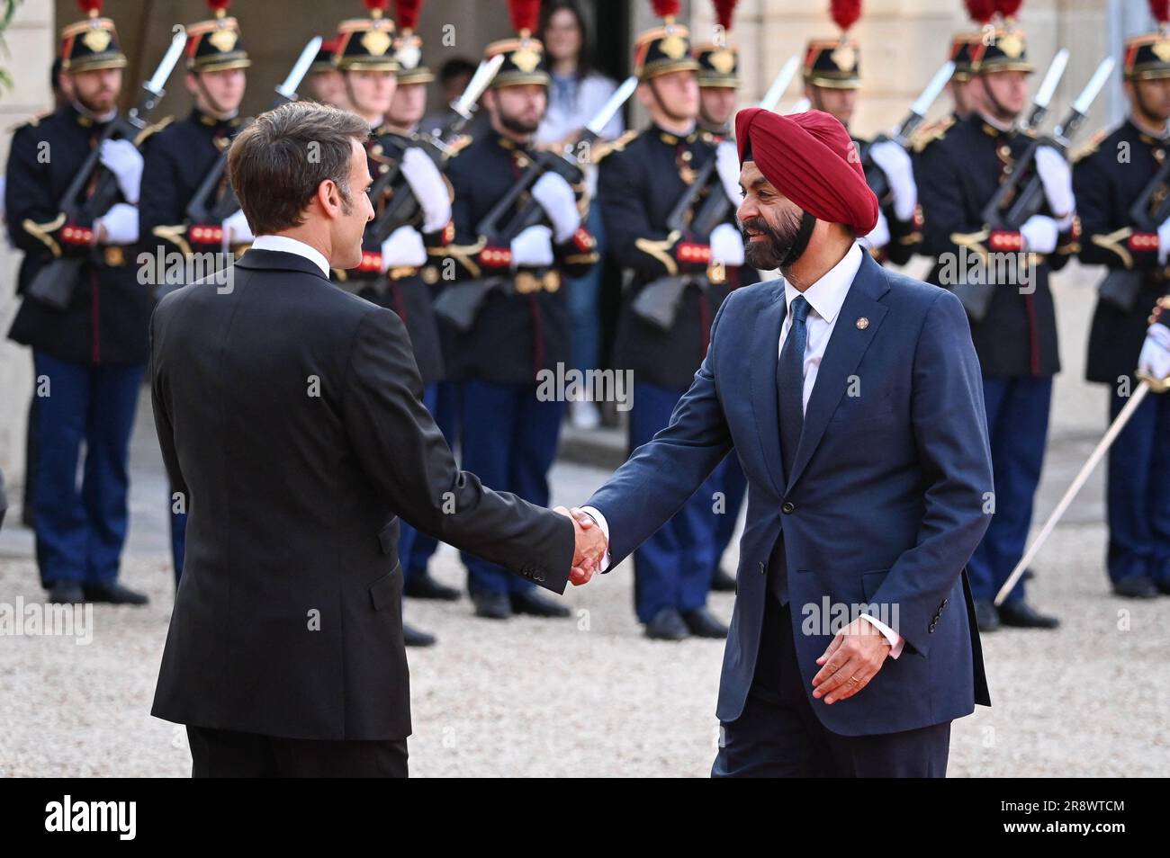French President Emmanuel Macron and his wife Brigitte Macron greet ...