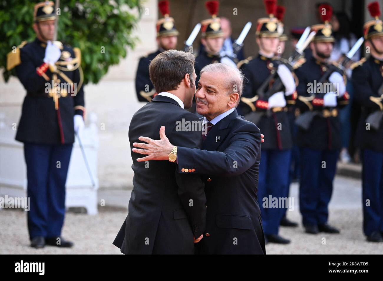 French President Emmanuel Macron greets Muhammad Shebbaz Sharif, Prime ...
