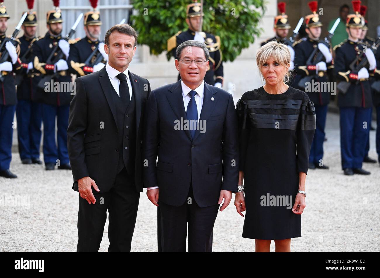 French President Emmanuel Macron and his wife Brigitte Macron greet ...