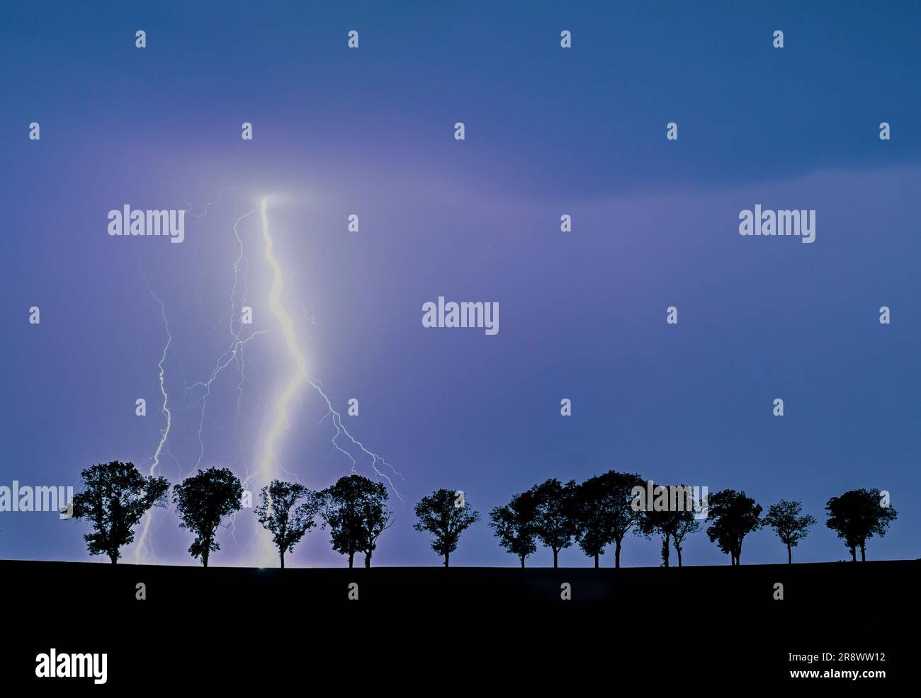 22 June 2023, Brandenburg, Müncheberg: A flash of lightning from a ...