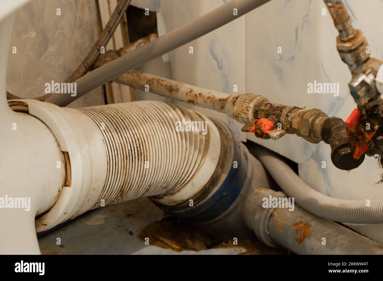 water pipe with taps in the bathroom, repair of the faucet in the ...