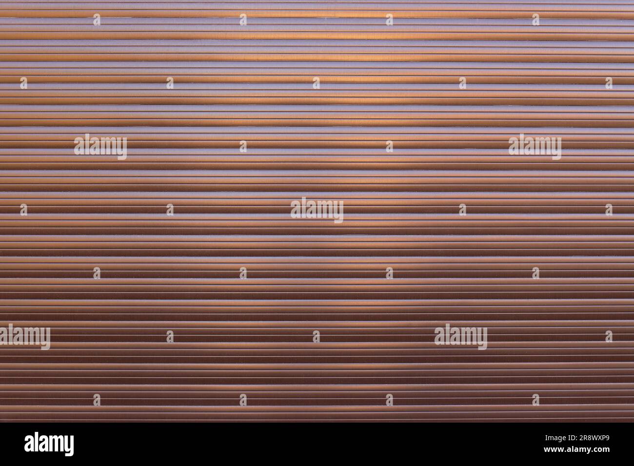 Brown roller shutter door or curtain. Grunge brown metal foldable door ...