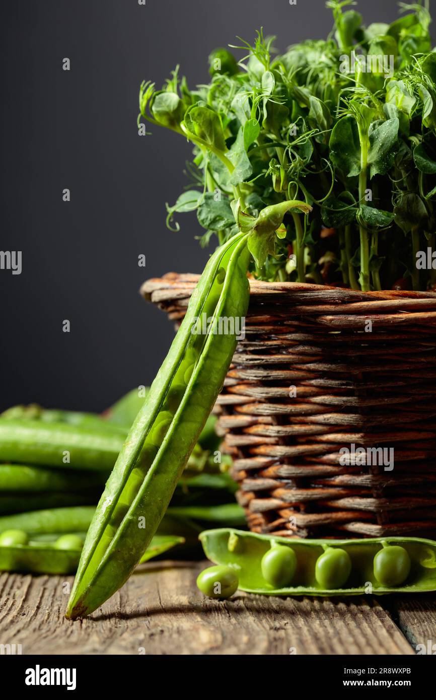 Fresh pea pods and microgreen sprouts. Concept of healthy food Stock ...