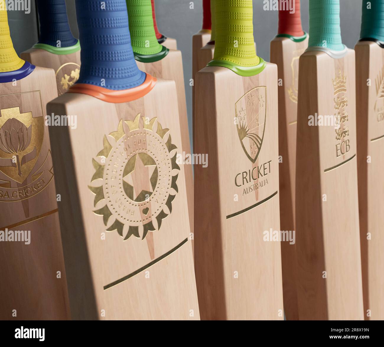 A collection of cricket bats imprinted with gold logos of the ICC ...