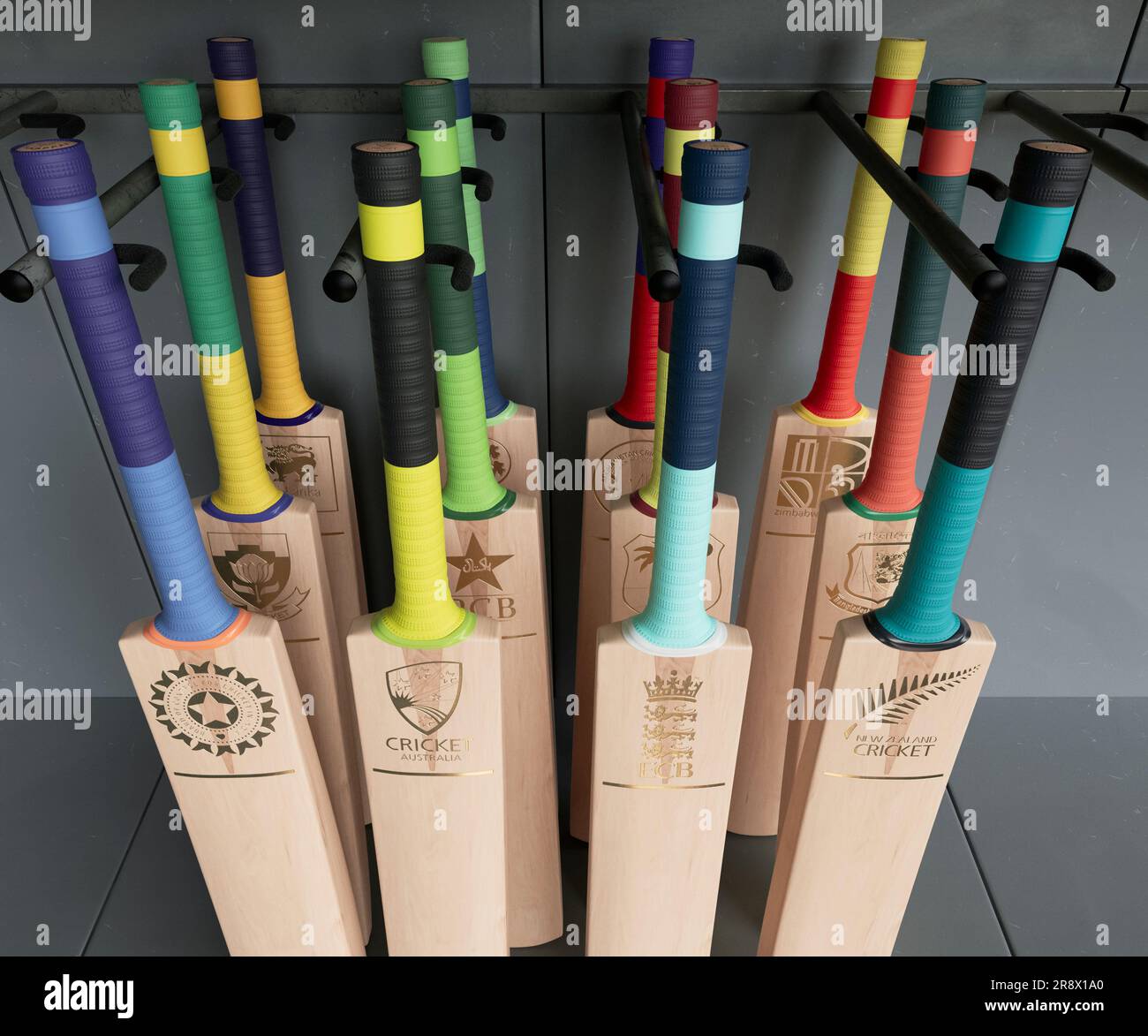A collection of cricket bats imprinted with gold logos of the ICC ...