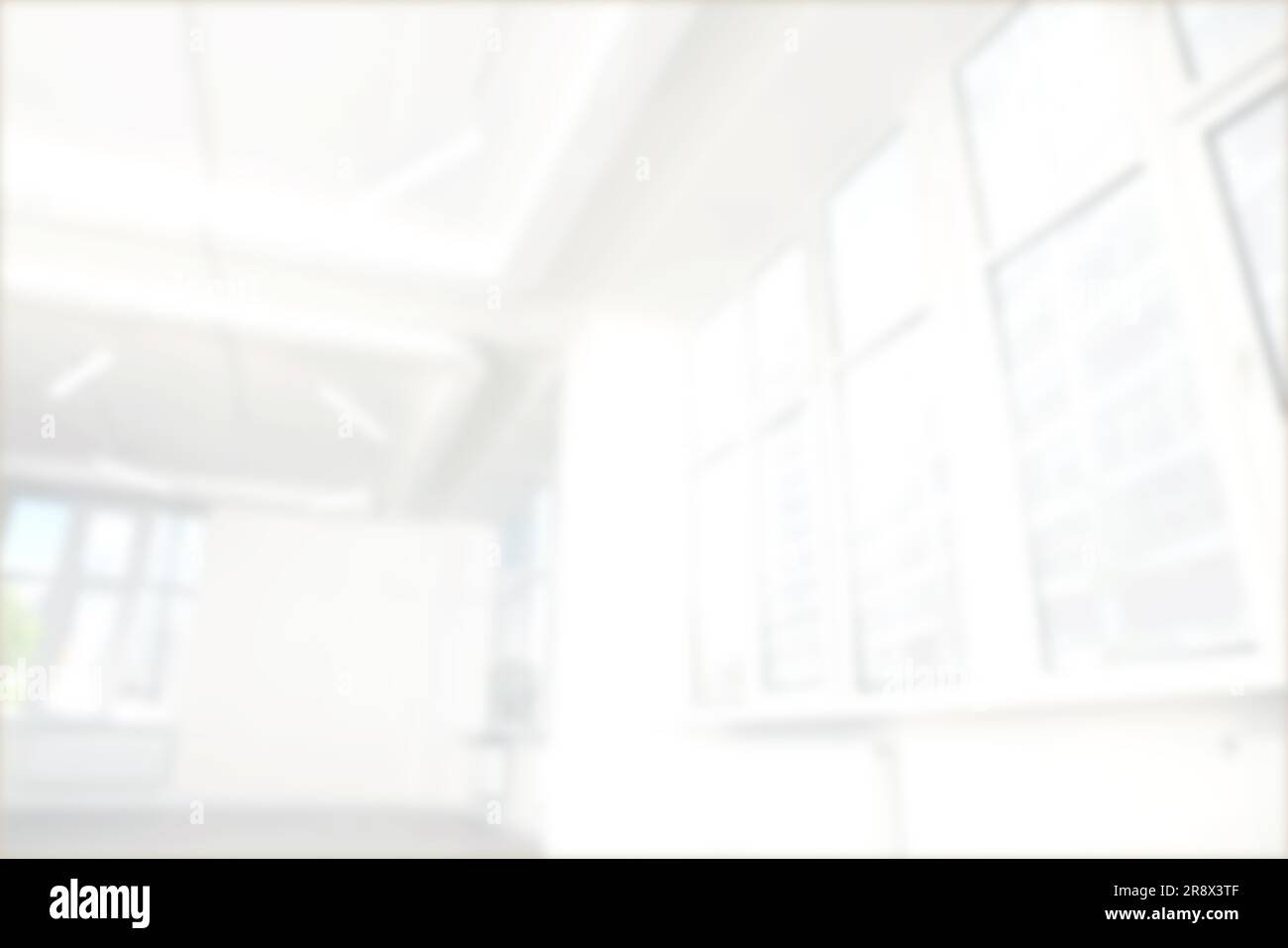 Empty room with white ceiling and windows, blurred view Stock Photo - Alamy