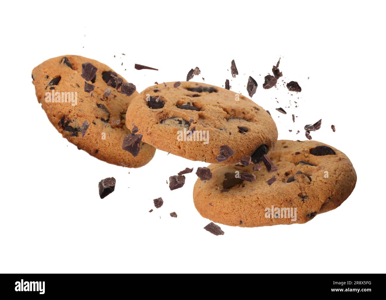 Tasty chocolate chip cookies falling on white background Stock Photo ...