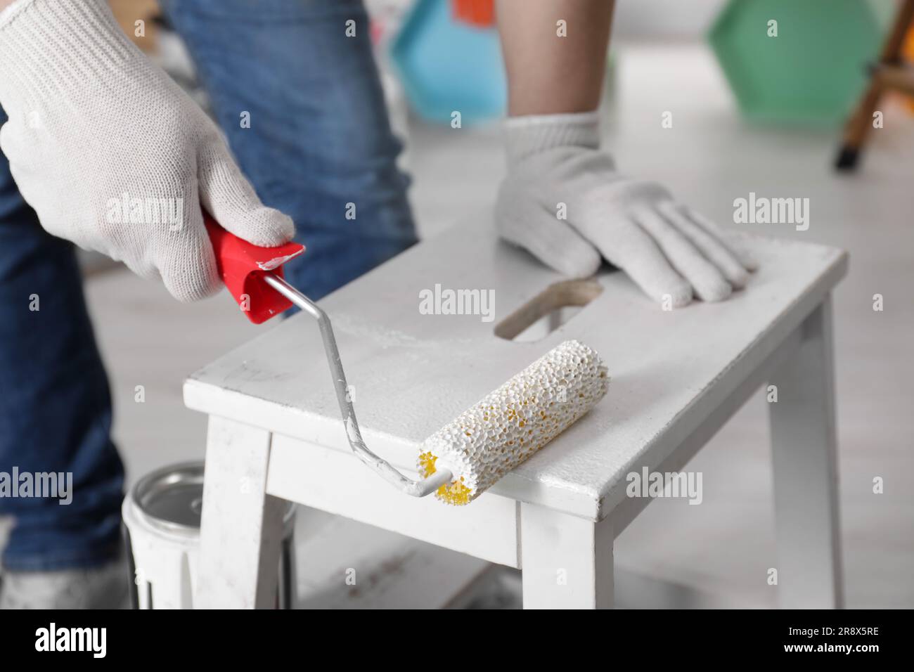 Man using roller hi-res stock photography and images - Alamy