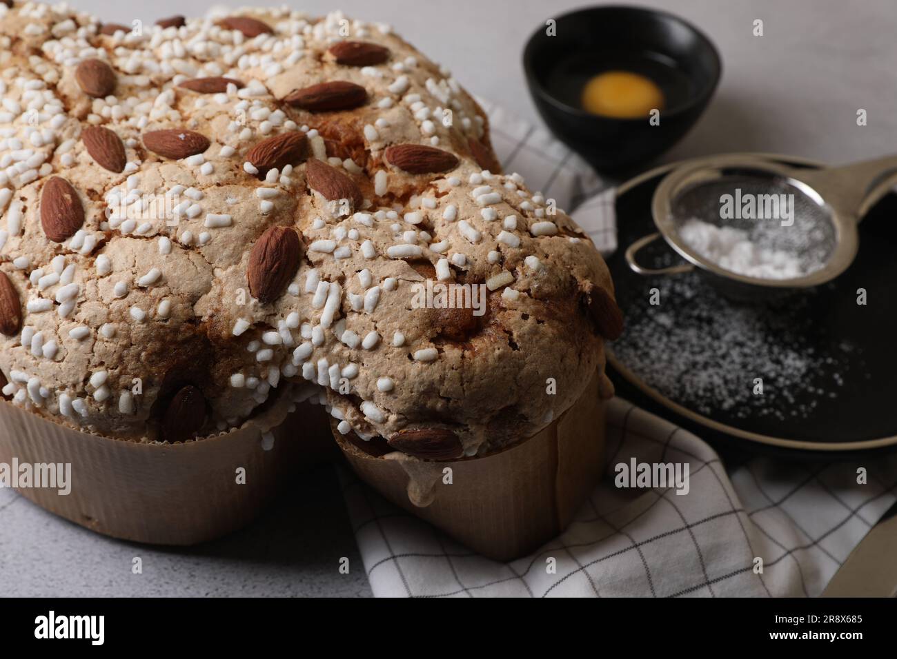 Delicious Italian Easter dove cake (Colomba di Pasqua) on grey table ...