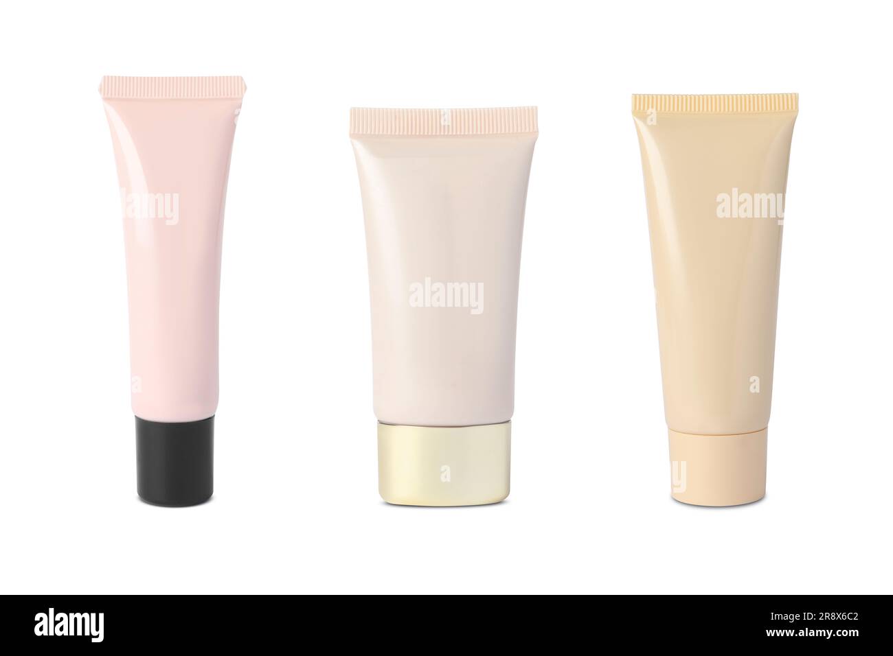 Collage with tubes of skin foundation on white background Stock Photo ...