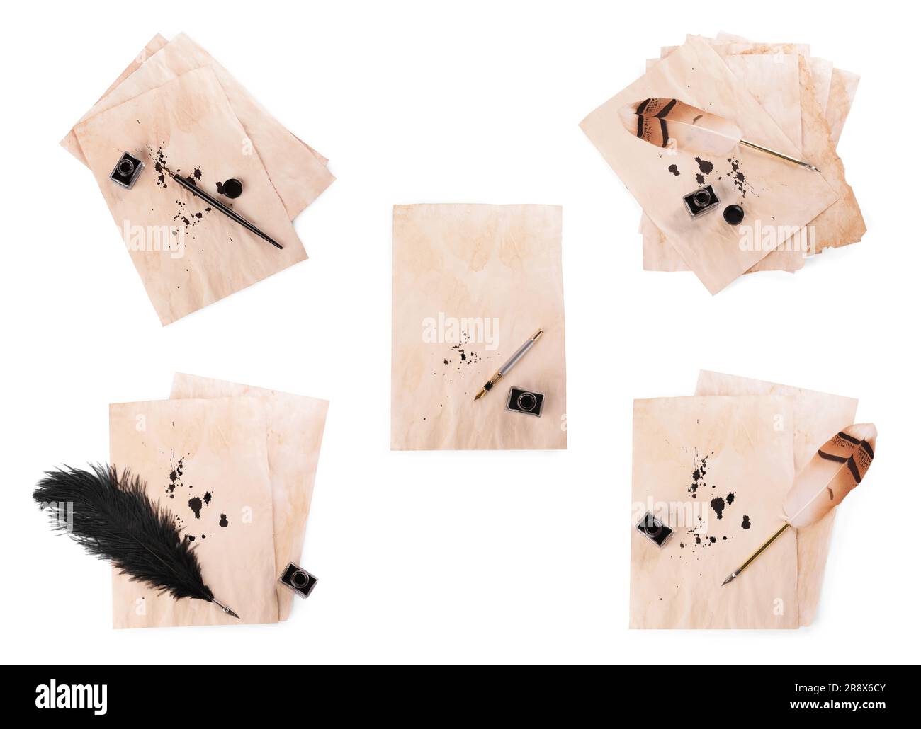 Many sheets of parchment with stains of ink, inkwell and different pens ...