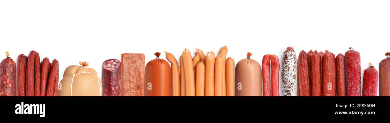 Many different tasty sausages on white background, top view. Banner ...