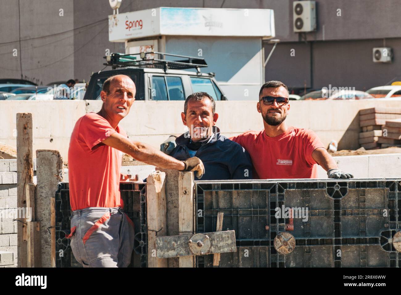 Kosovan builers pose for a photo in Ferizaj, Kosovo Stock Photo - Alamy