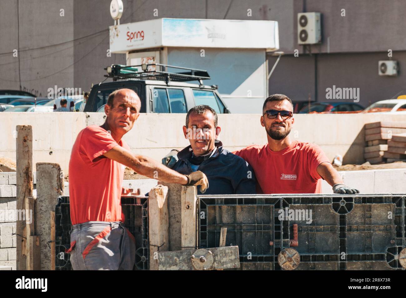 Kosovan builers pose for a photo in Ferizaj, Kosovo Stock Photo - Alamy