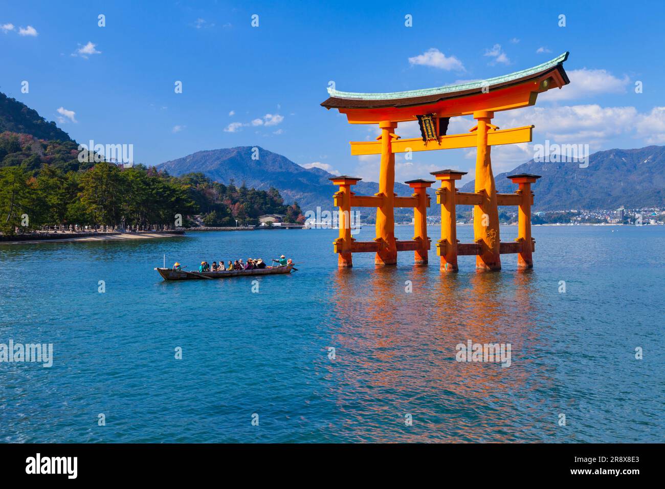 A tourist boat and big shrine gates on Miyajima Stock Photo - Alamy