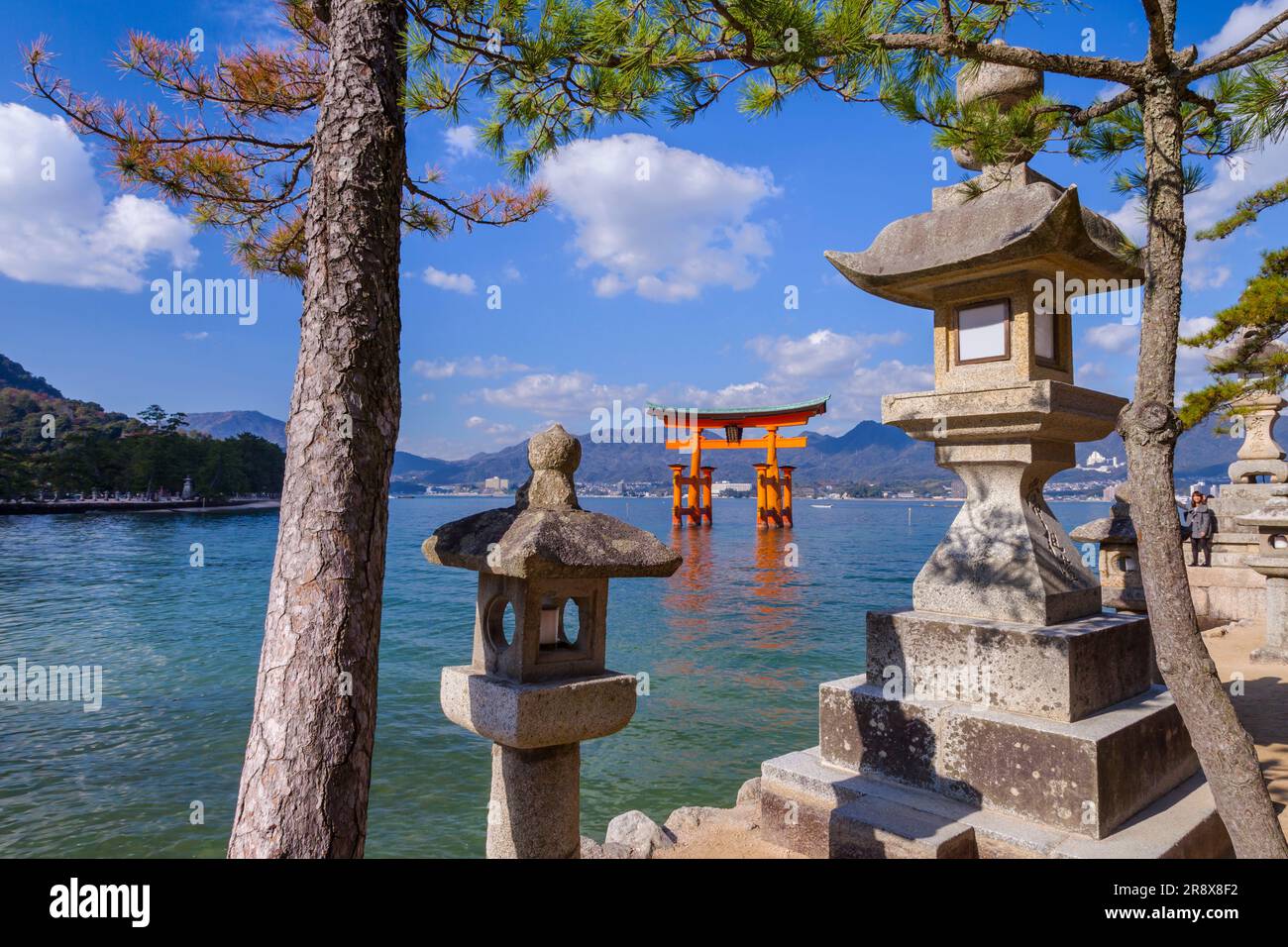 Itsukushima shrine stone torii hi-res stock photography and images - Alamy