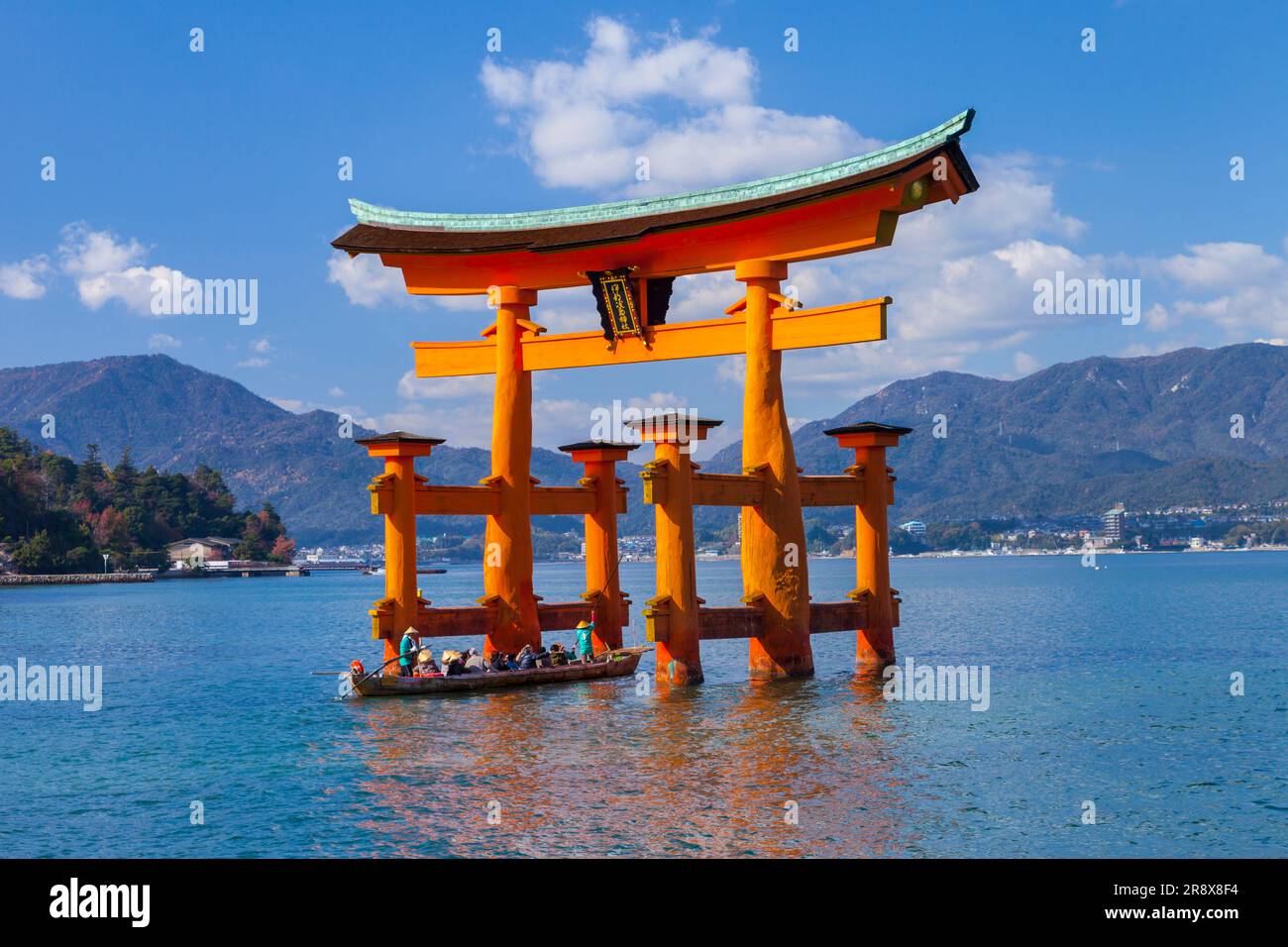 A tourist boat and big shrine gates on Miyajima Stock Photo - Alamy