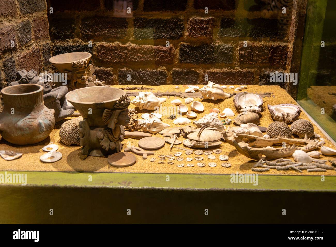 Display of offering bones, pottery, shells, archaeological site and ...