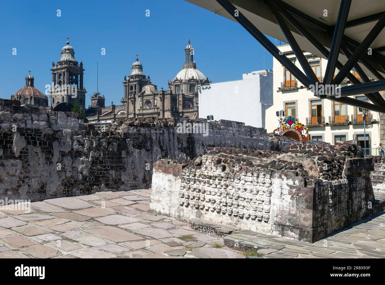 Wall of stone skulls called Tzompantli, archaeological site and museum ...