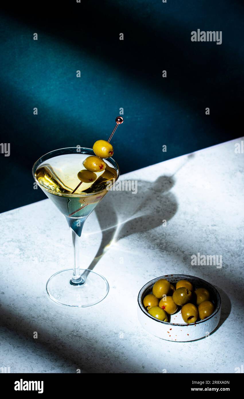 Vodka martini with olives, alcoholic cocktail drink with vodka and ...