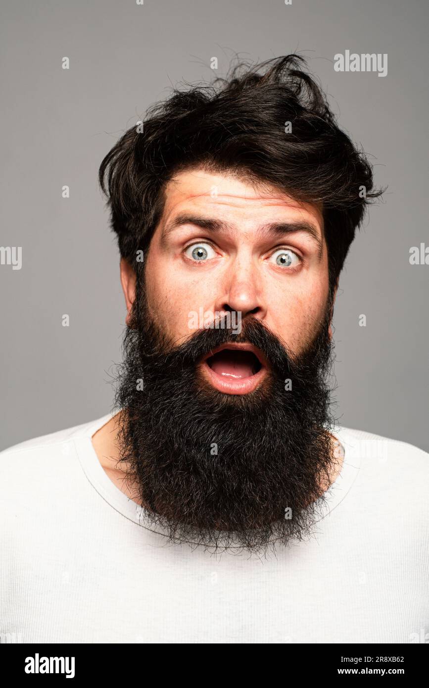 Surprised handsome man. Shocked male model with surprise expression ...