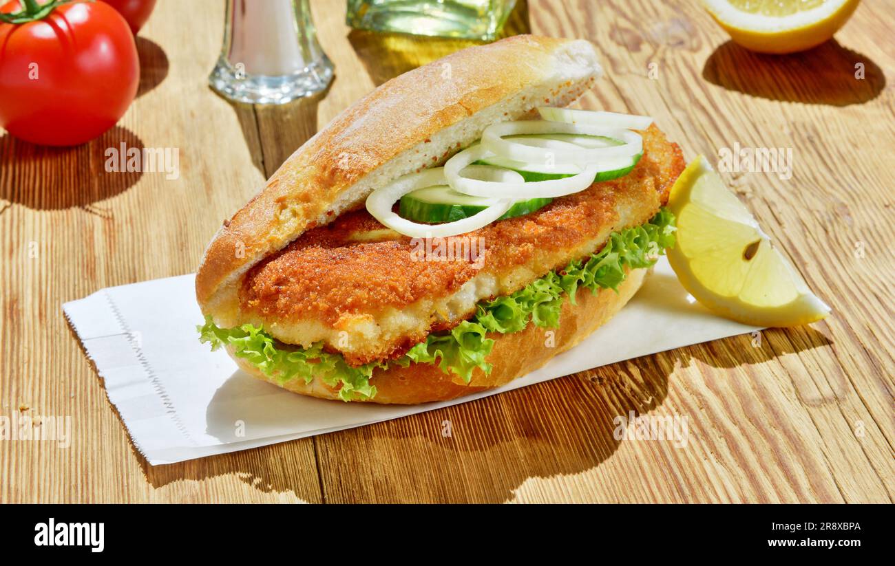Baked Fish in a Bun - Outdoor in Summertime Stock Photo - Alamy