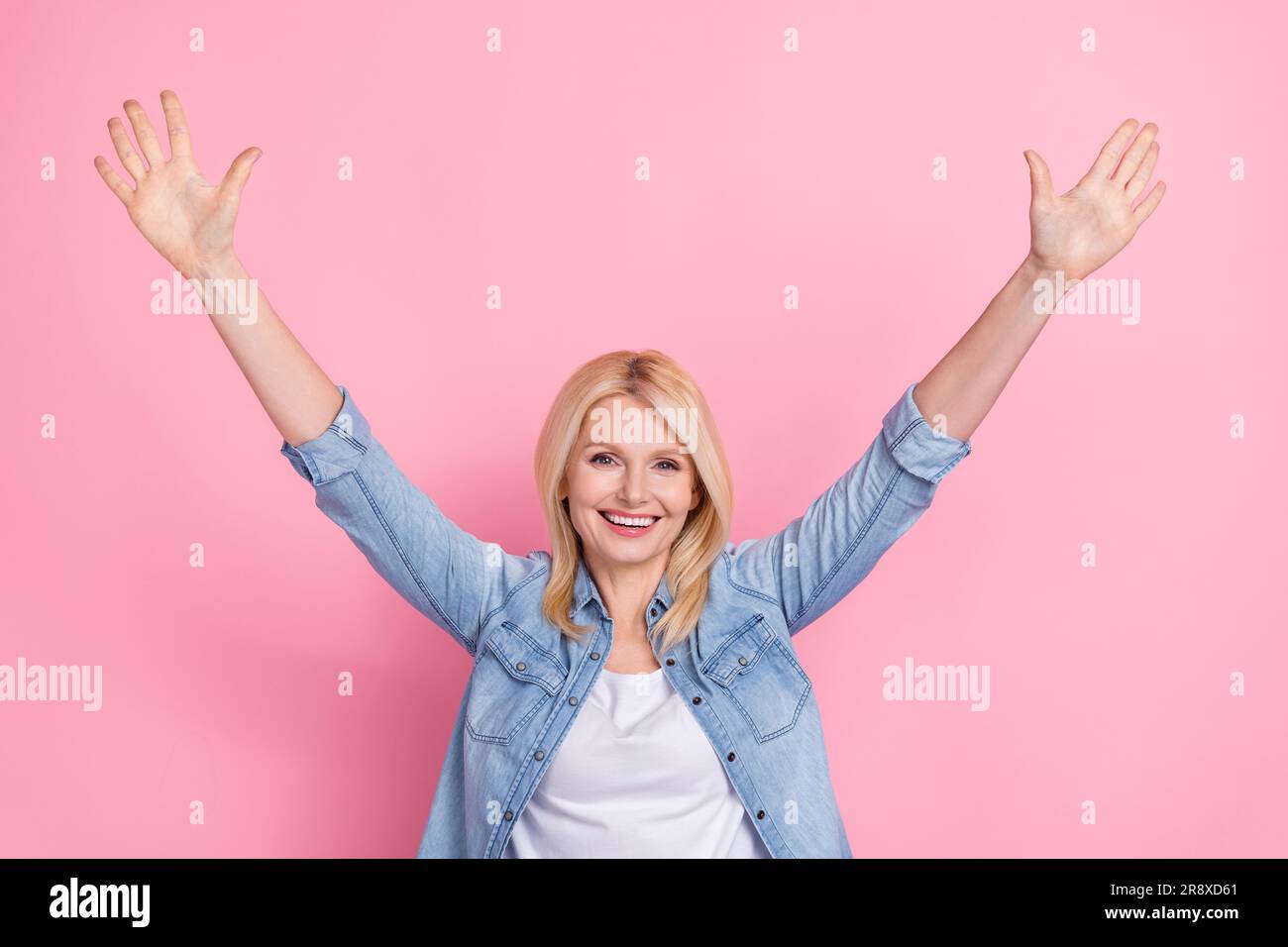 Photo of pretty senior lady raise arms up air feel good carefree ...