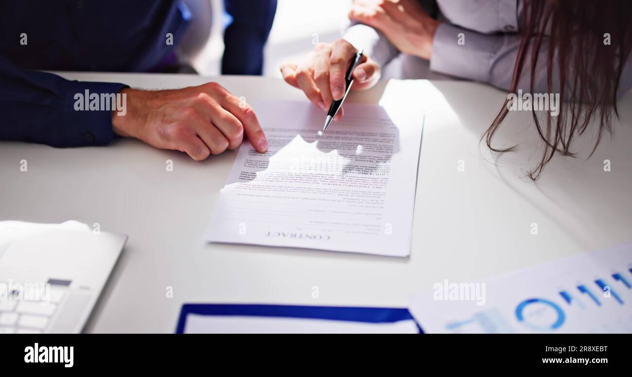Lawyer Hand Document Review And Contract Mediation Stock Photo - Alamy
