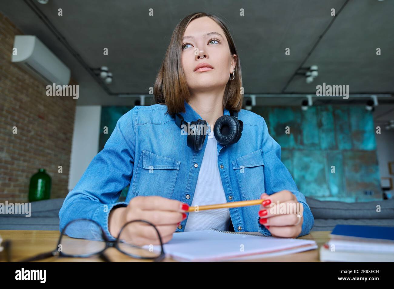 Close-up webcam view of face female university student Stock Photo - Alamy