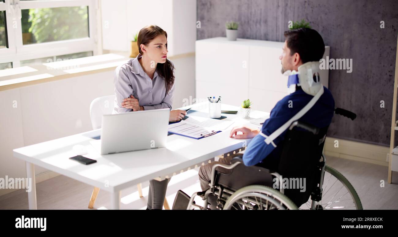 Accident Disability Claims Attorney Or Lawyer And Injured Client Stock ...