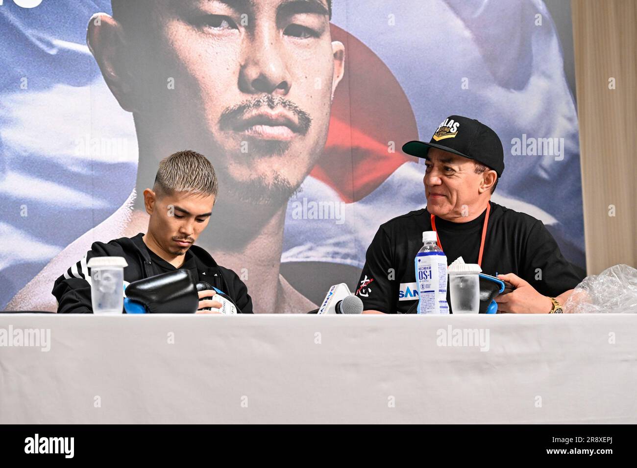 Kazuto Ioka (L) of Japan and his trainer Ismael Salas during the weigh ...