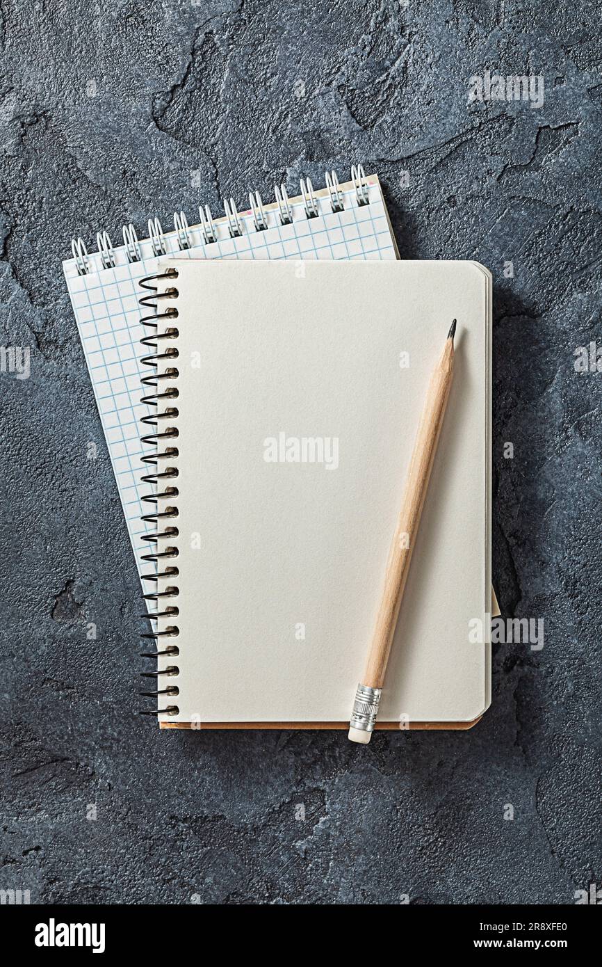 Two Classic Notepads On Stone Background Stock Photo - Alamy