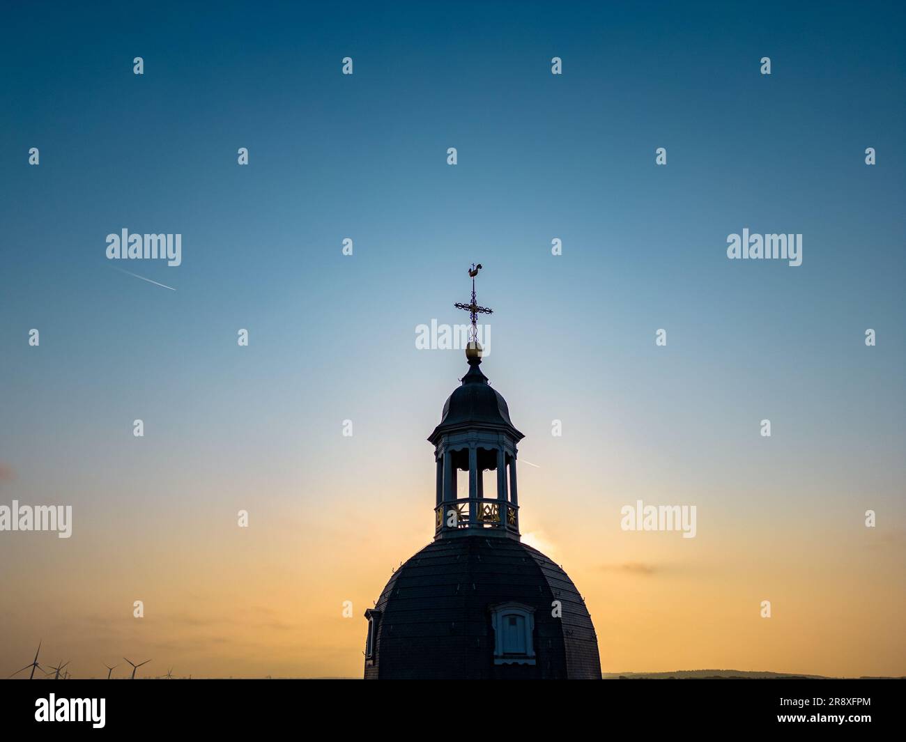 Aerial view of the silhouette of a heavenly religious church or chapel ...
