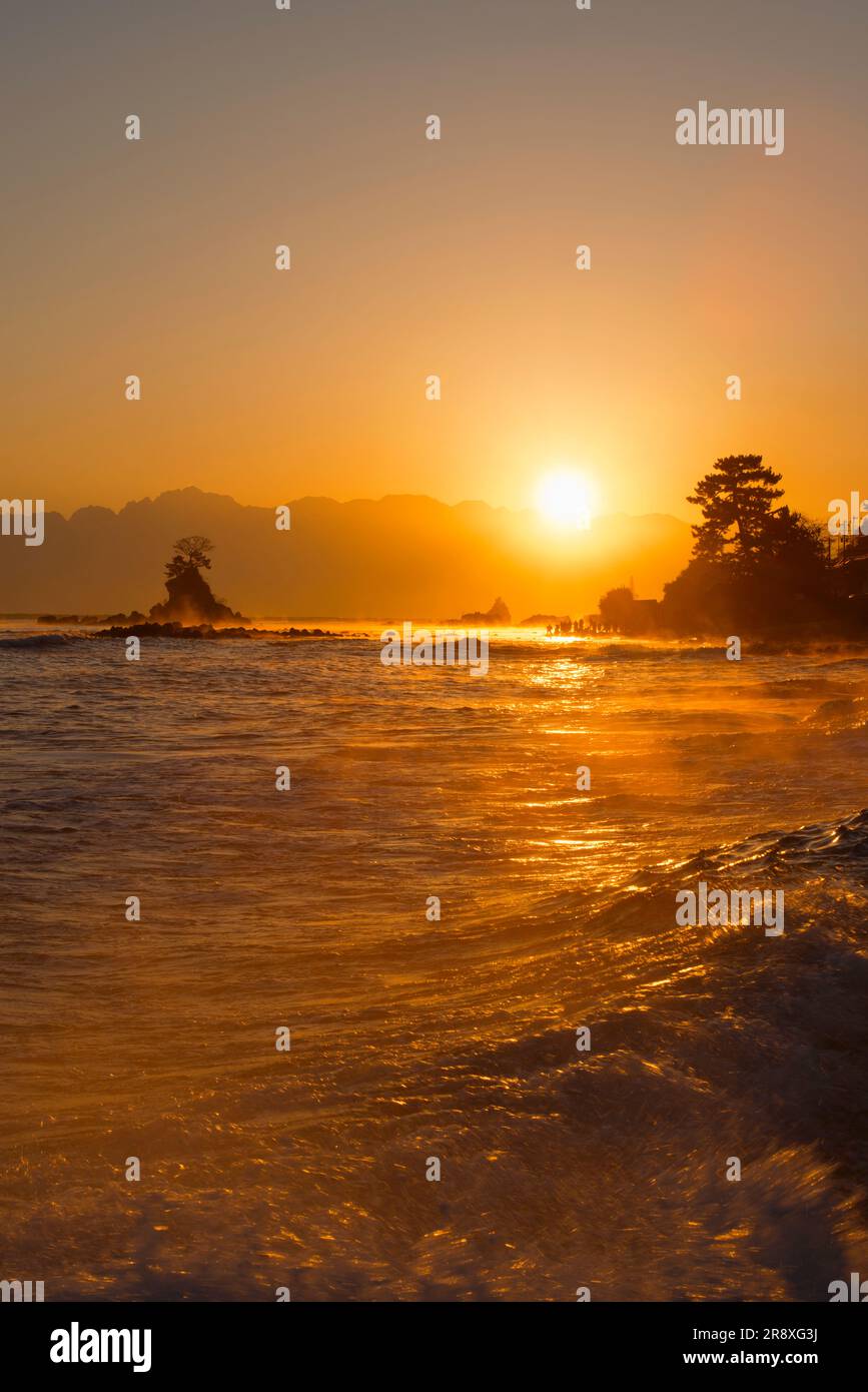 Amaharashi coast and the morning sun Stock Photo - Alamy