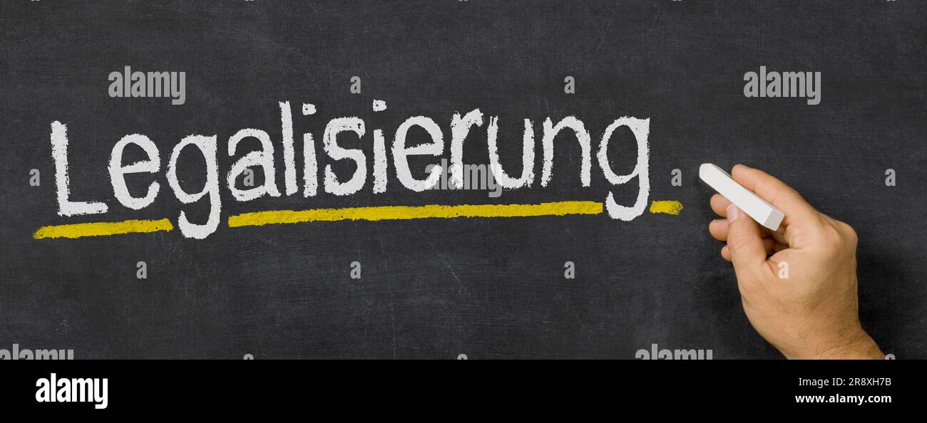 Text written on a blackboard - Legalization in german - Legalisierung ...