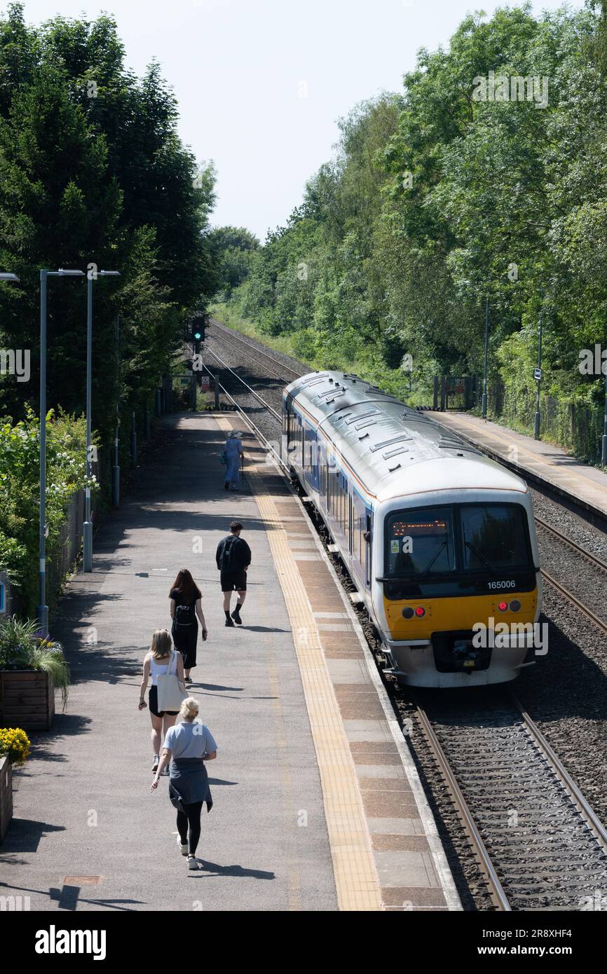 Passengers catching a Chiltern Railways train at Lapworth station ...