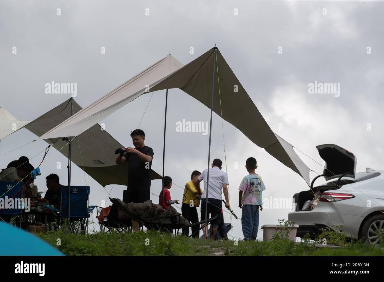 CHONGQING, CHINA - JUNE 23, 2023 - Tourists enjoy camping in Mazui ...