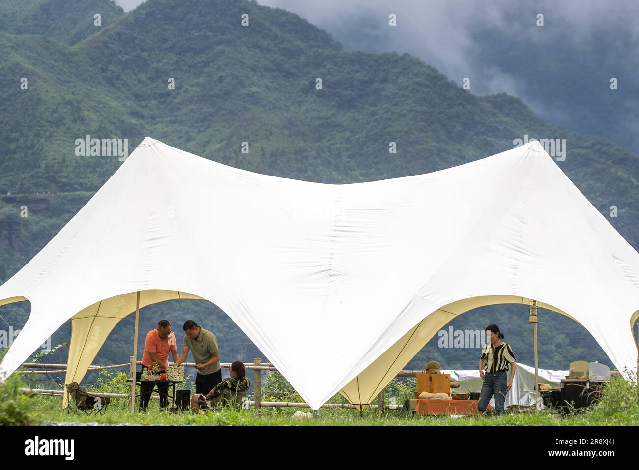 CHONGQING, CHINA - JUNE 23, 2023 - Tourists enjoy camping in Mazui ...