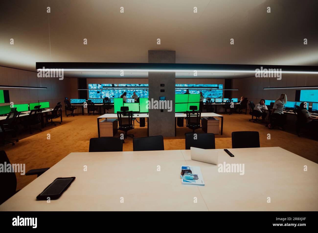 Group of Security data center operators working in a CCTV monitoring ...