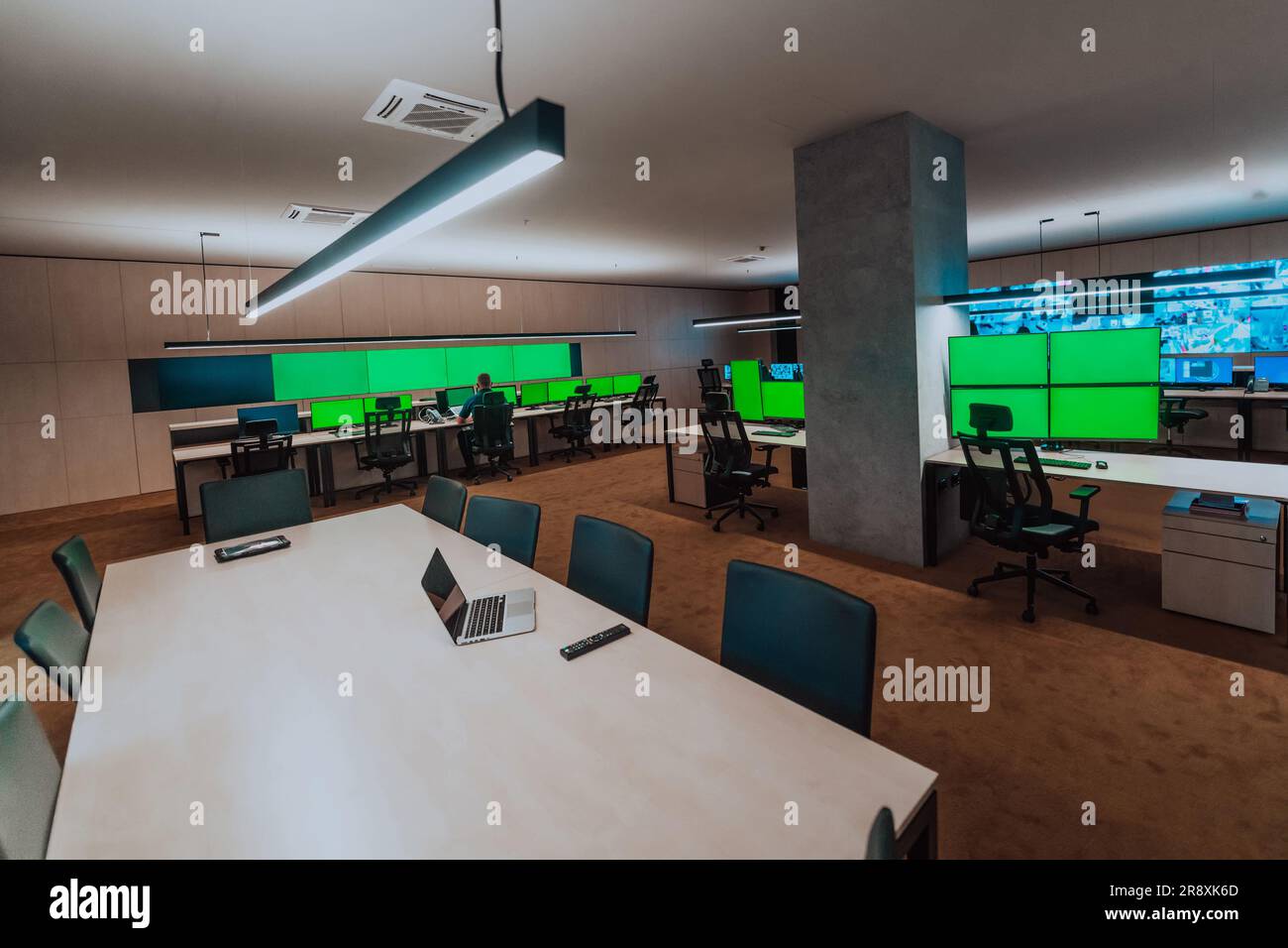 Group of Security data center operators working in a CCTV monitoring ...